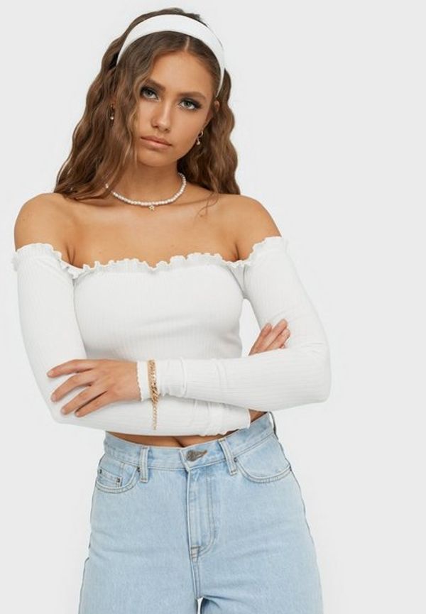 Långärmade toppar med volanger dam (2025) • Nu upp till 70% rabatt | Alissa